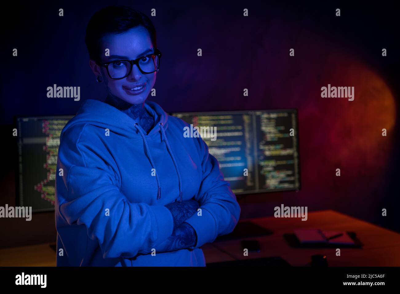 Tattoo girl with folded arms hi-res stock photography and images - Alamy