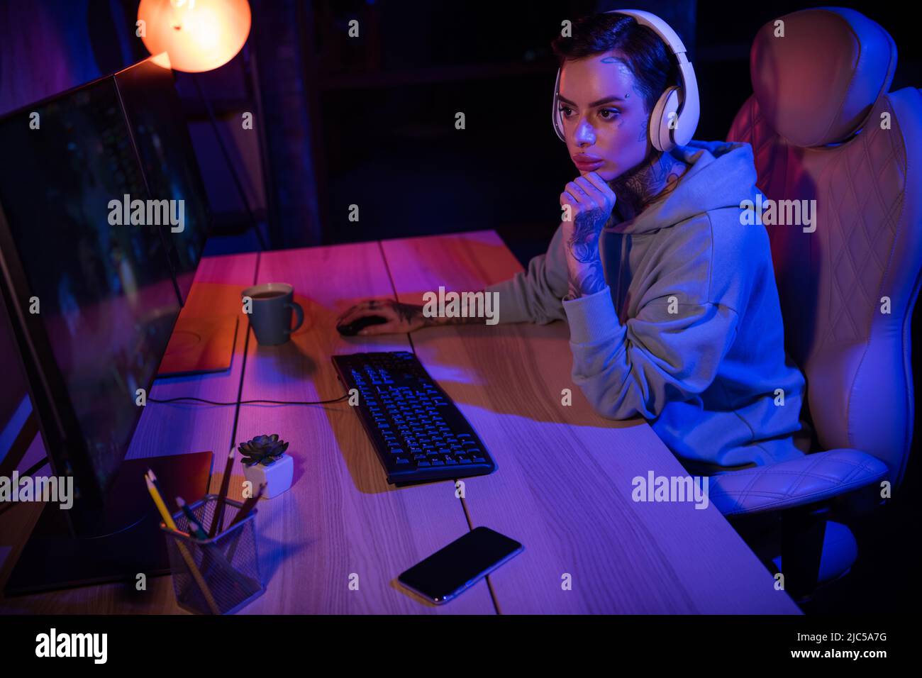 Profile portrait of professional gamer girl sitting chair arm touch ...