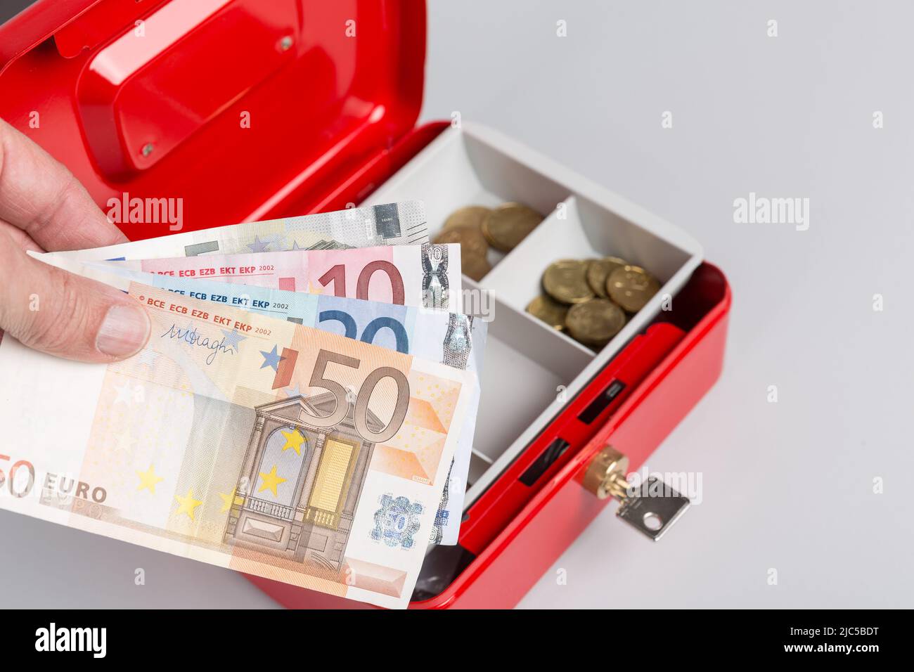 Box full of money hi-res stock photography and images - Alamy