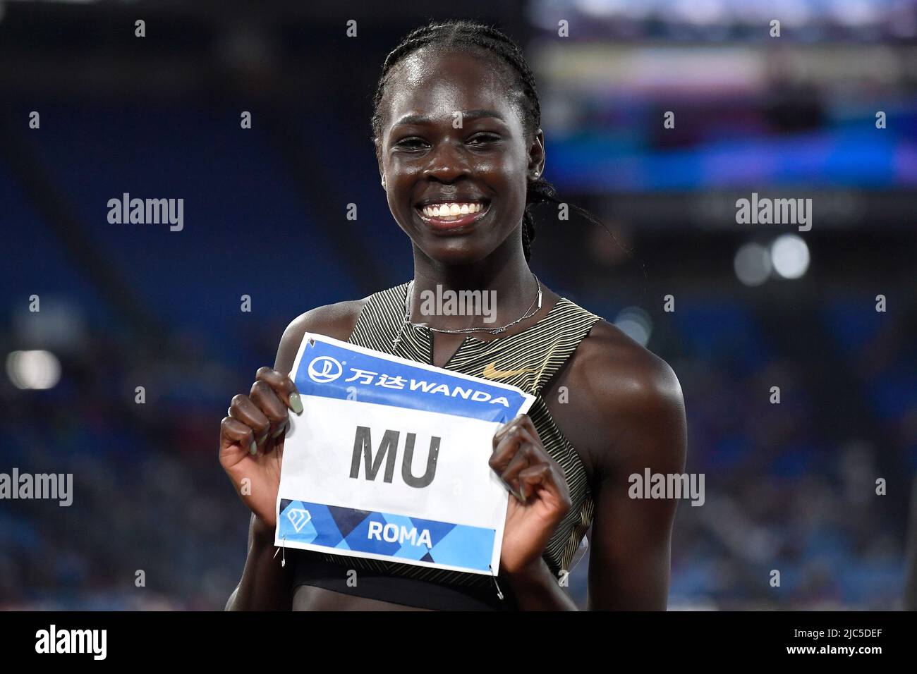 Athing Mu of United States poses for a photograph after compete in the ...