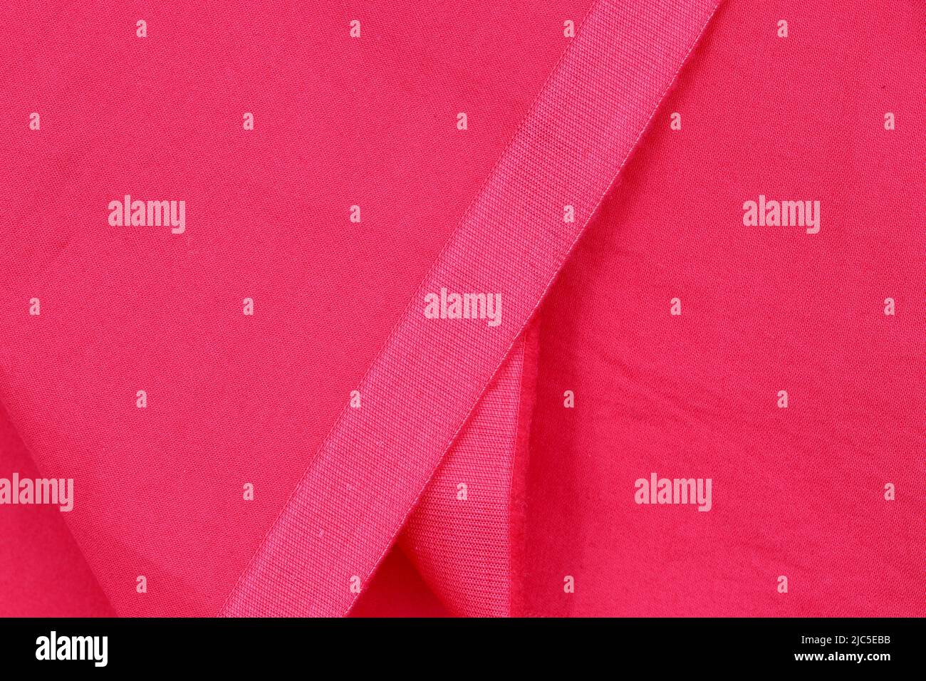 Close-up red fabric texture background Stock Photo - Alamy