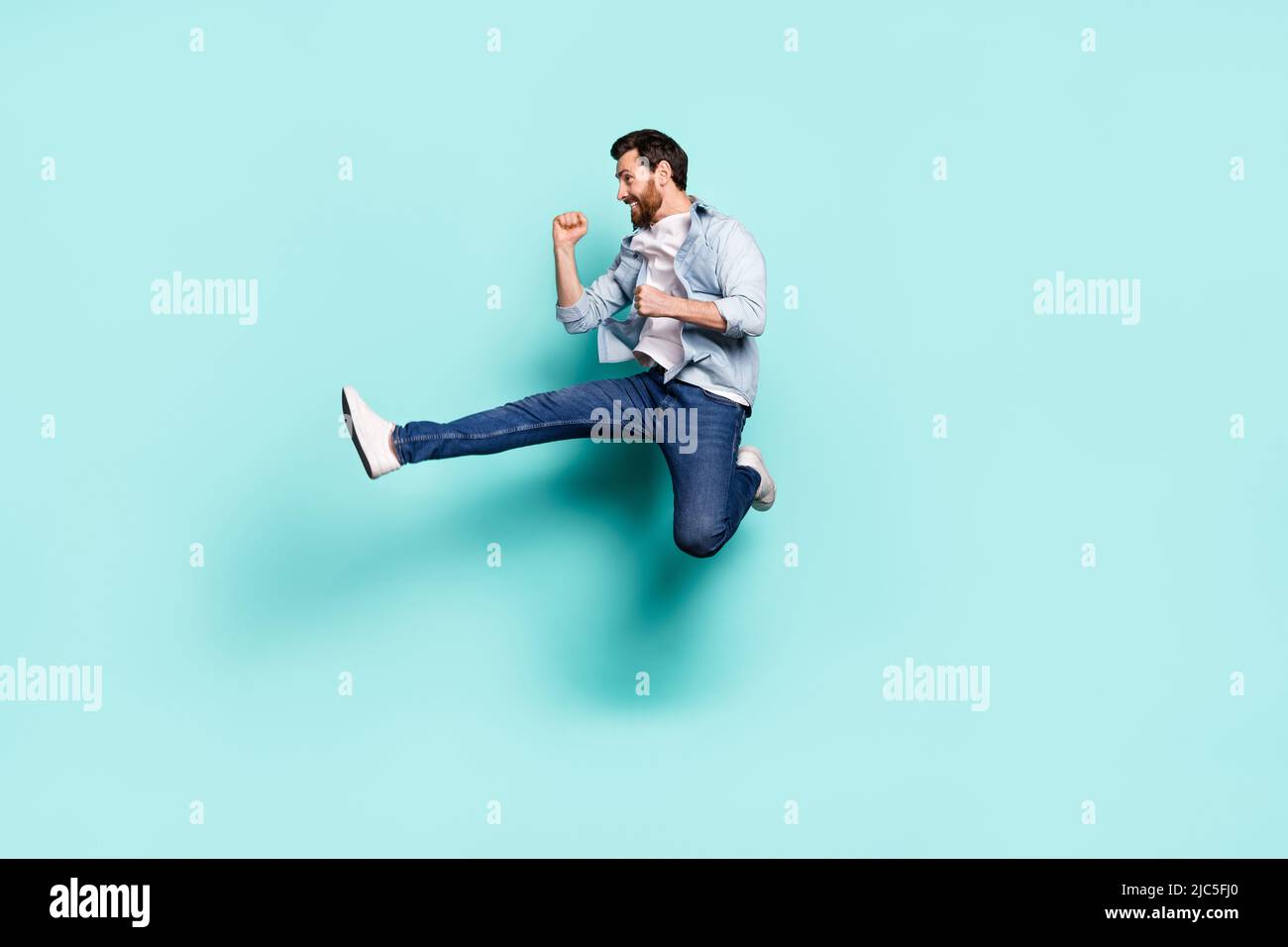 Full size photo of overjoyed glad person jumping fight air isolated on ...