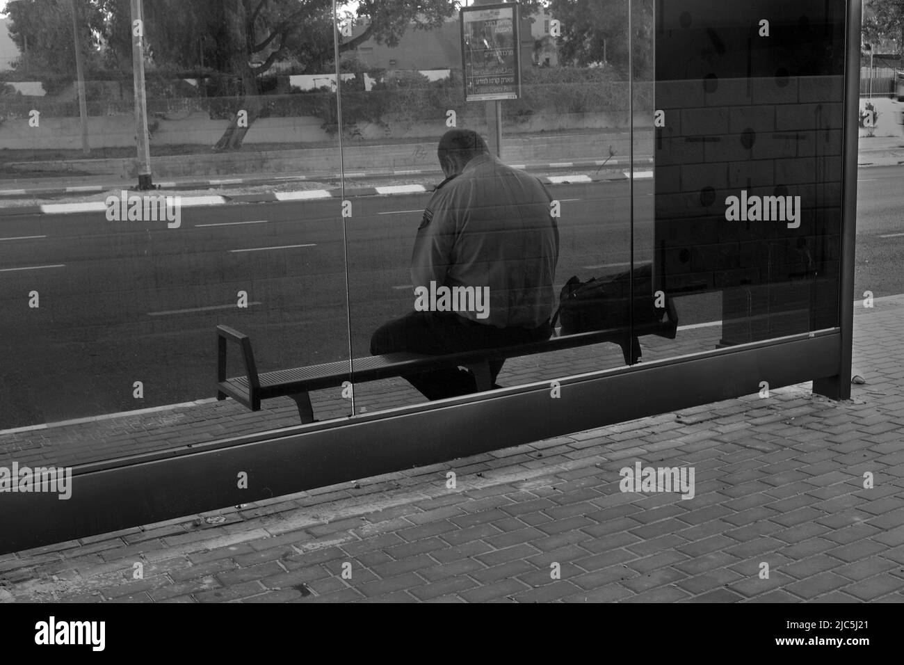 In bus stop man Black and White Stock Photos & Images - Alamy