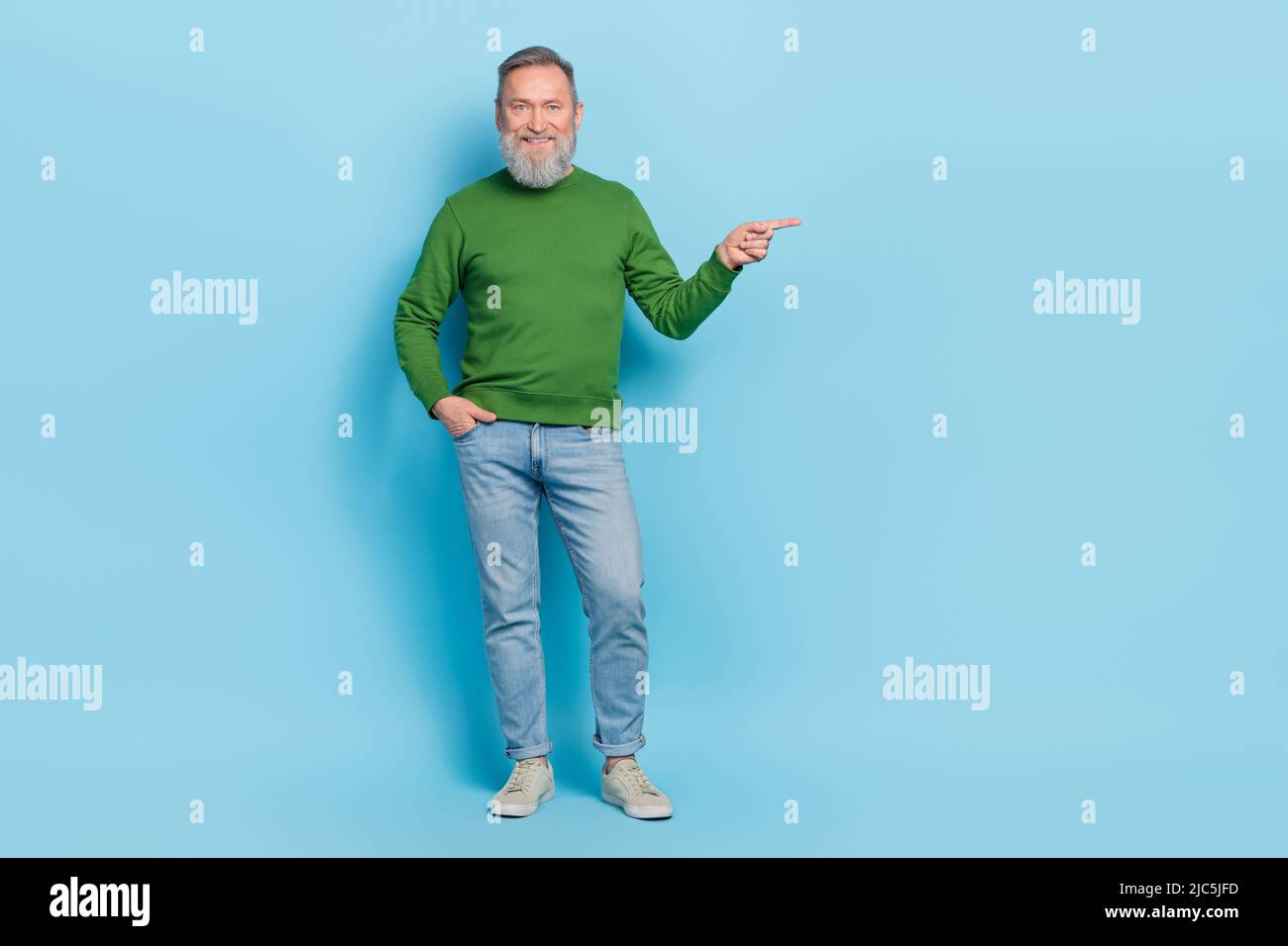 Photo of positive aged man promoter point empty space advert promo wear ...