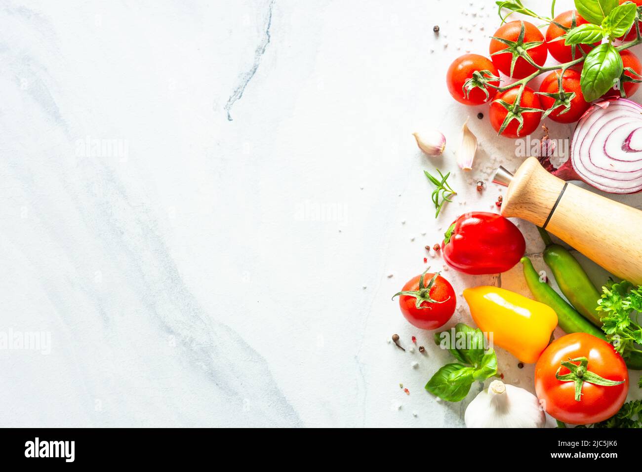 Food cooking background on white marble table Stock Photo - Alamy