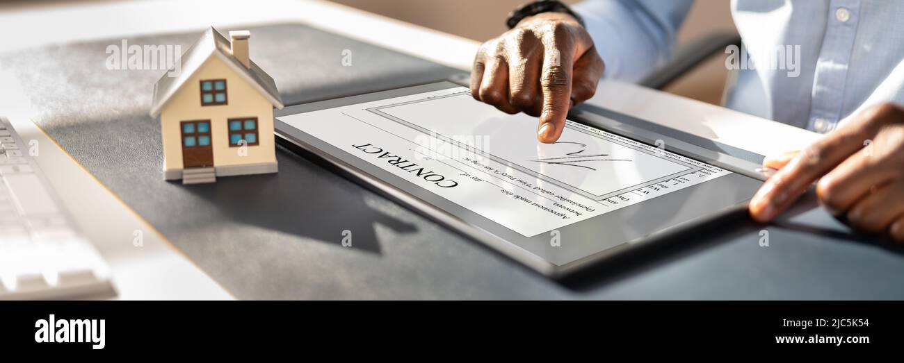 E Signing Property Deed And House Ownership Document Stock Photo - Alamy