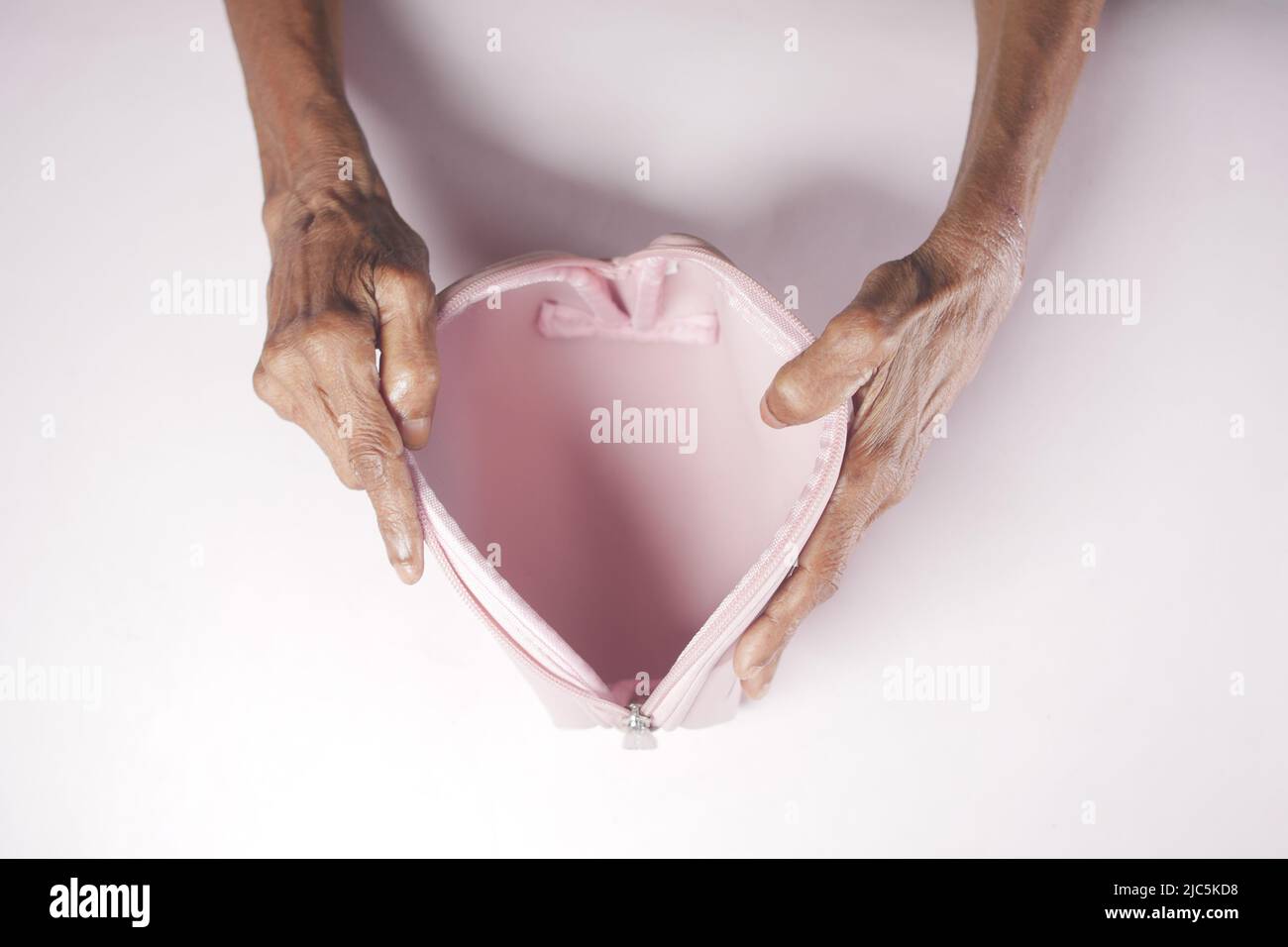 senior women hand open an empty wallet with copy space Stock Photo - Alamy
