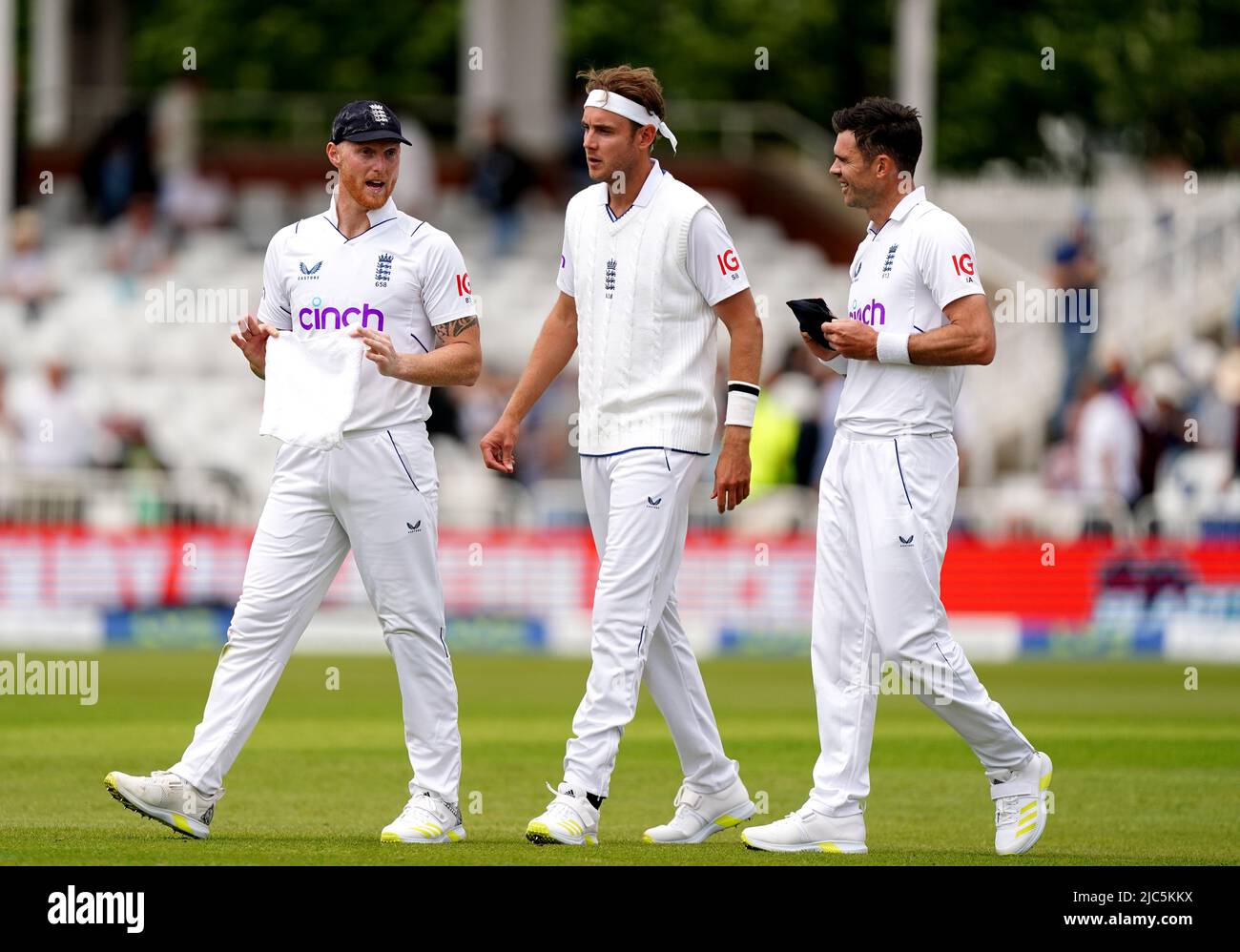 l-r; England's captain Ben Stokes, Stuart Broad and James Anderson walk ...
