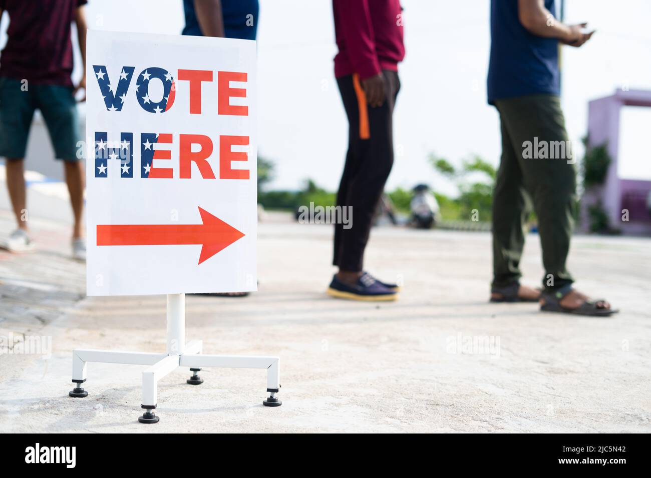 People in line waiting for casting vote near polling booth vote here ...