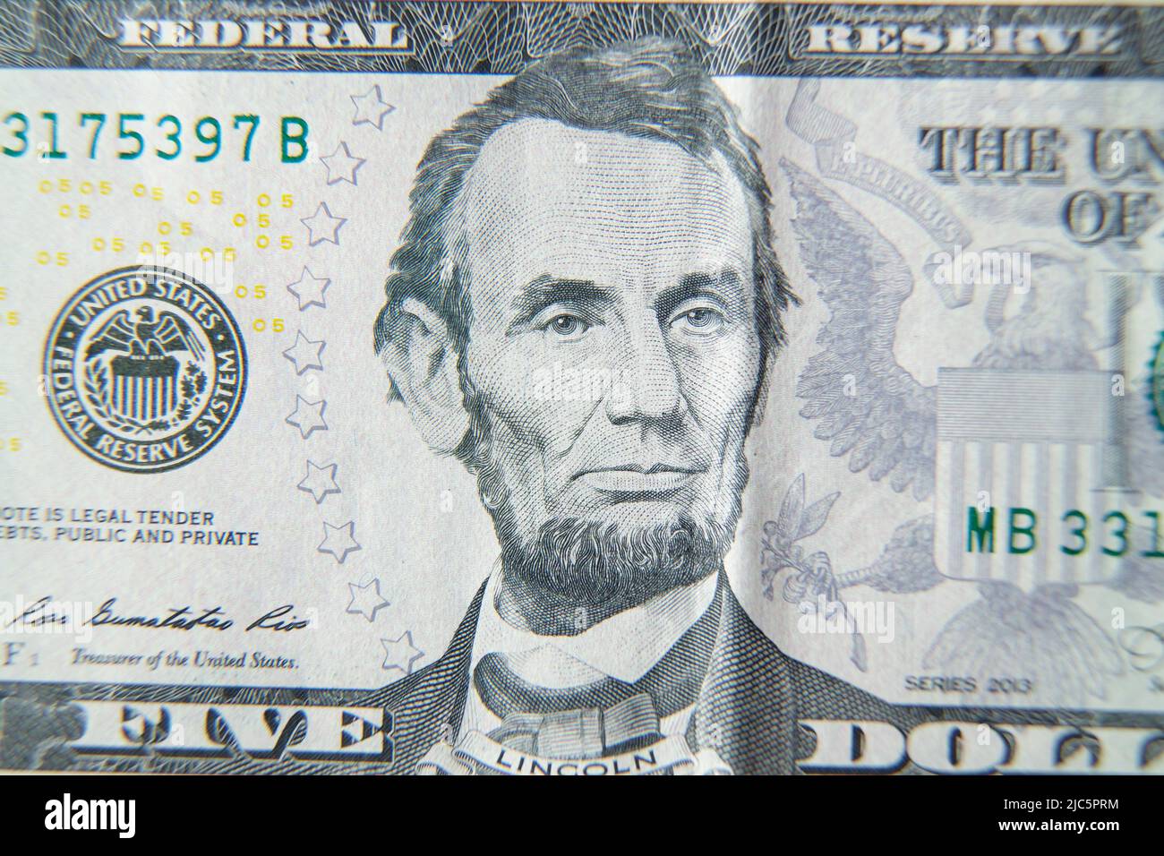 Five US dollars close-up. Paper bill dollars Stock Photo - Alamy