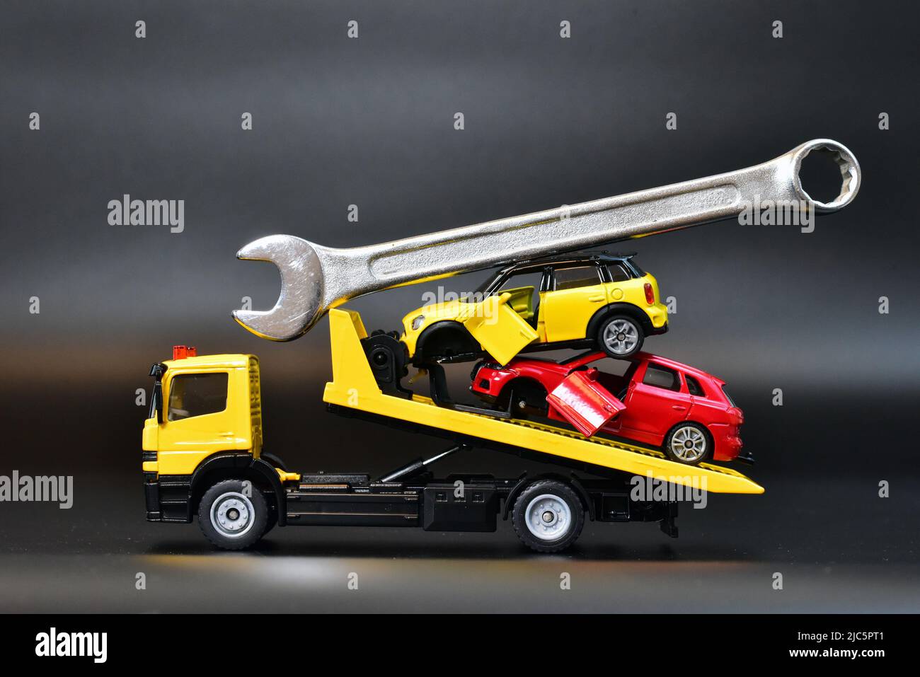 broken toy cars with wrench tool Stock Photo - Alamy