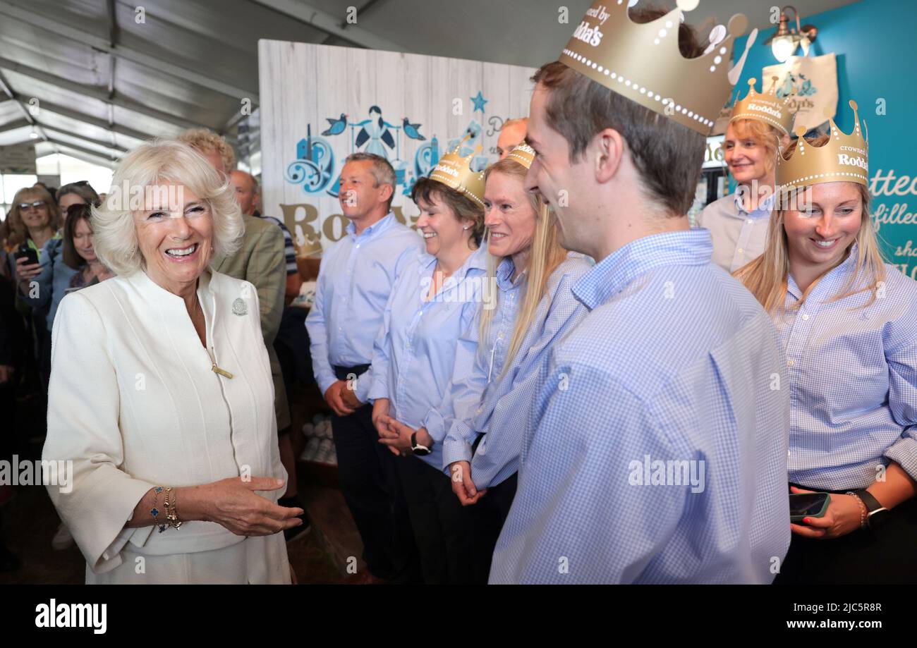 The Duchess of Cornwall laughs with exhibitors from Rodda's Cornish ...