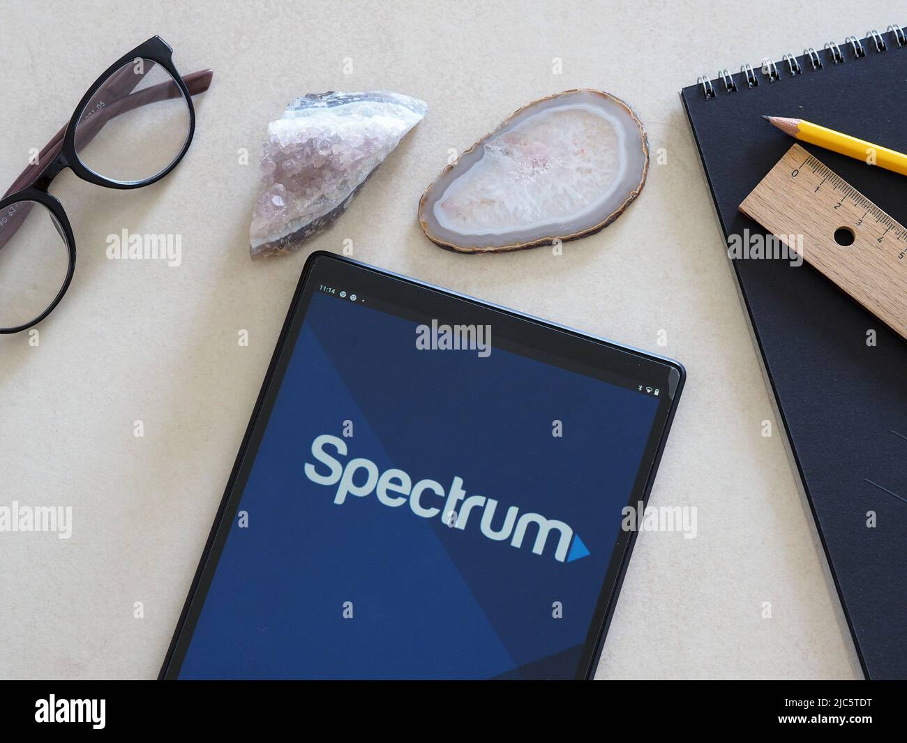 In this photo illustration CVS logo seen displayed on a tablet Stock ...