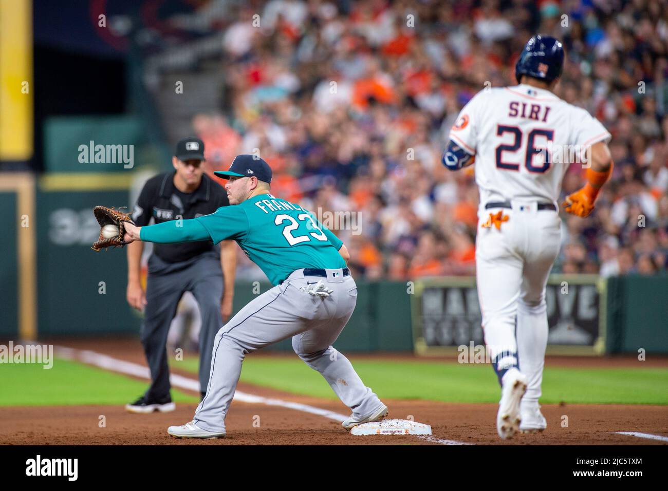 Seattle Mariners third baseman Ty France (23) completes a force-out at ...