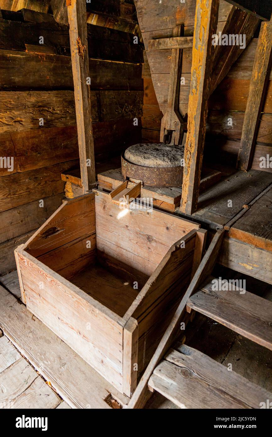 Ancient mill made of stones and wood. Weet grinding machine used in ...