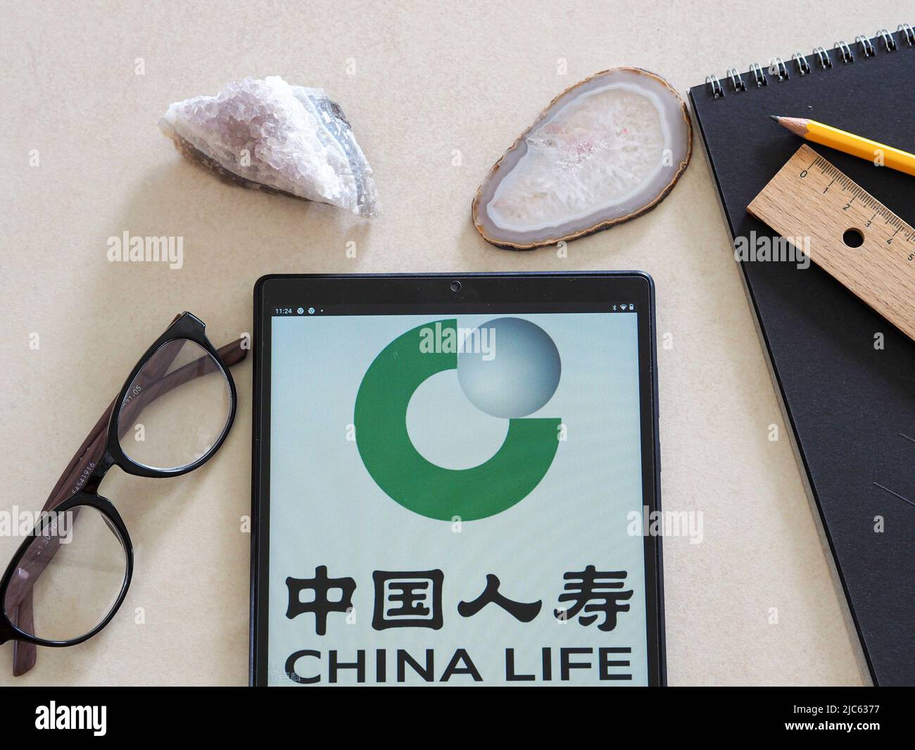 In this photo illustration, a China Life Insurance Company logo seen ...