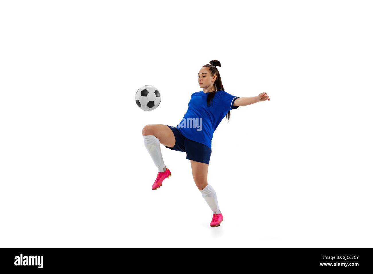 One sportive girl, female soccer, football player training isolated on ...