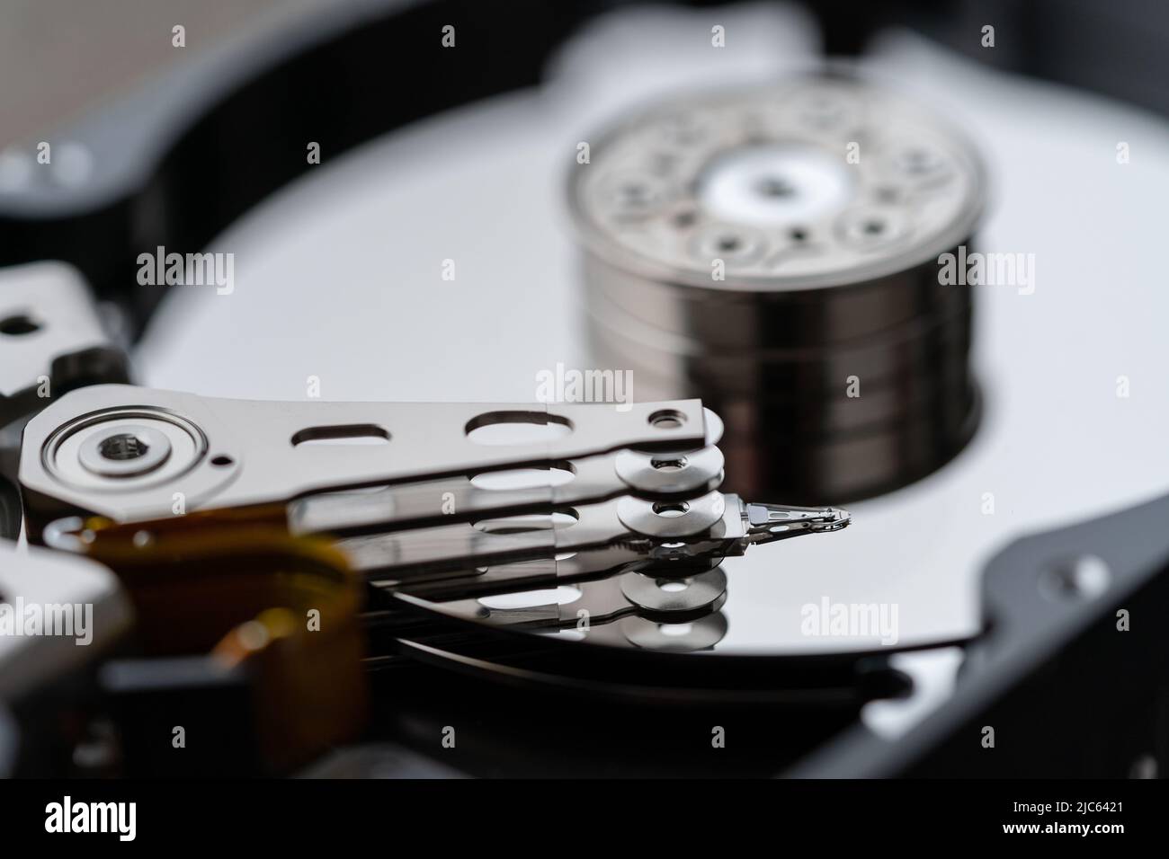 Opened hard disk after disassembly during repair or service, macro shot ...