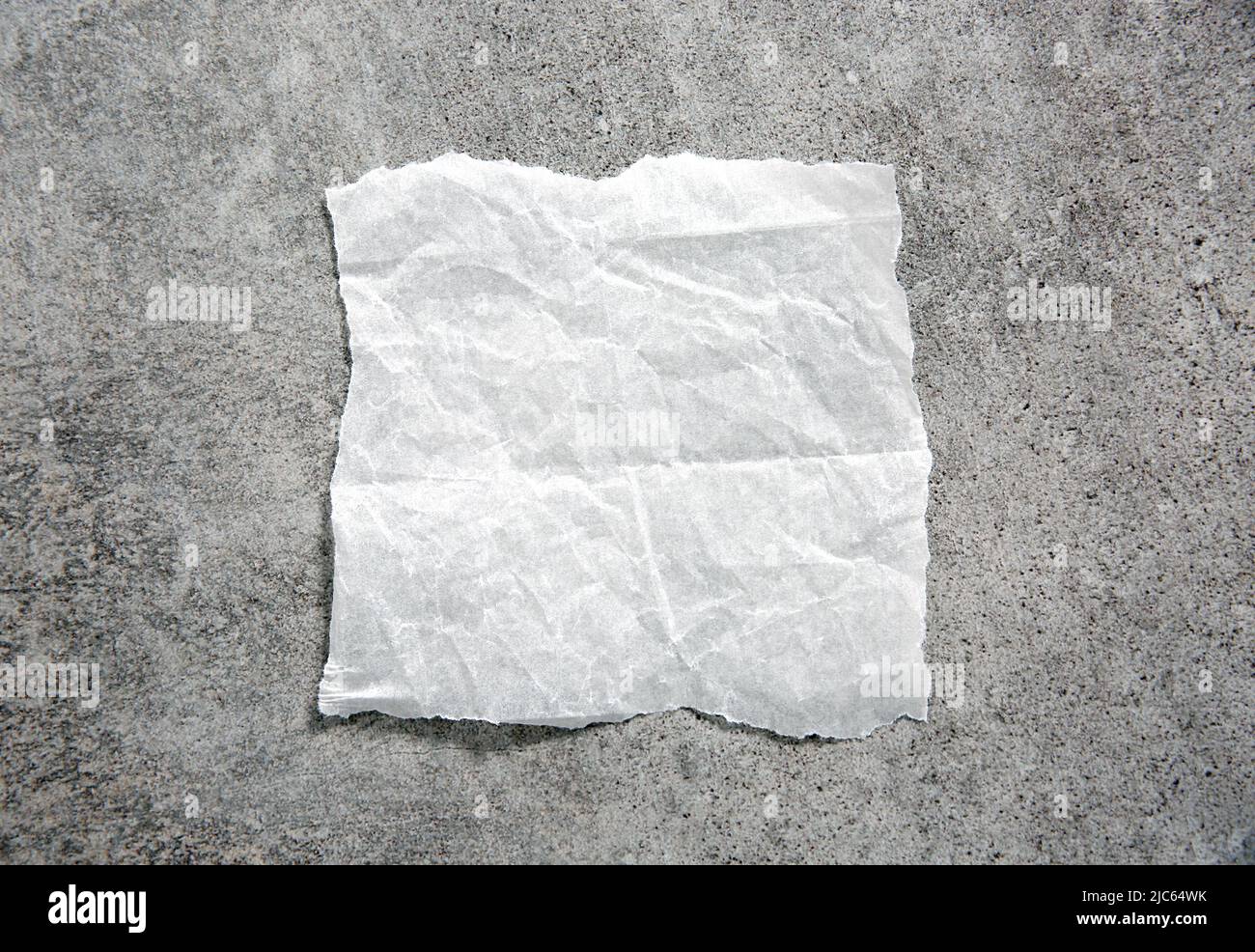 White crumpled square paper,napkin top view on grey stone table.Food ...