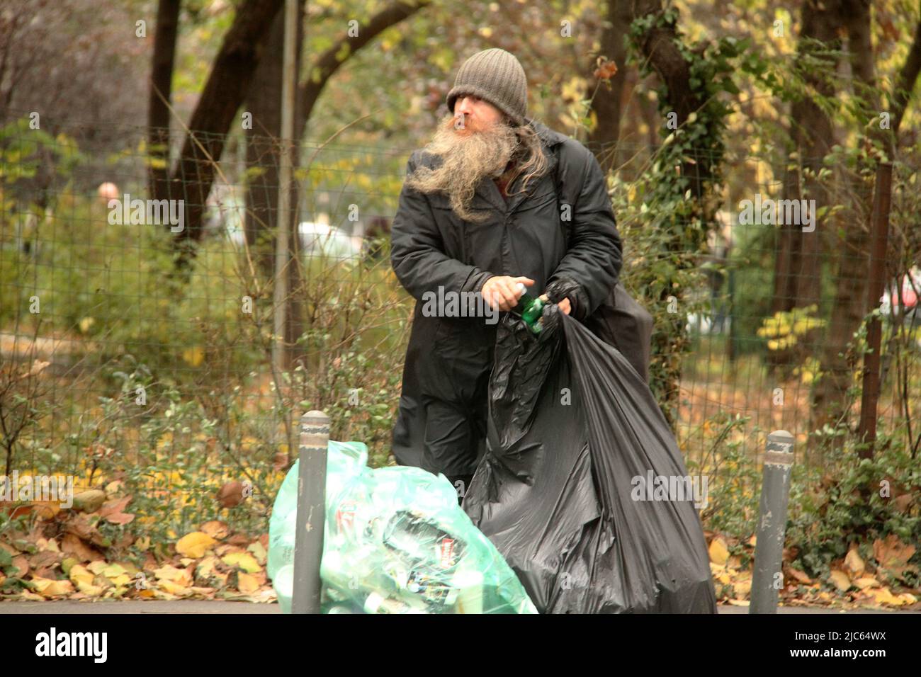 Elderly homeless man in Bucharest, Romania Stock Photo - Alamy