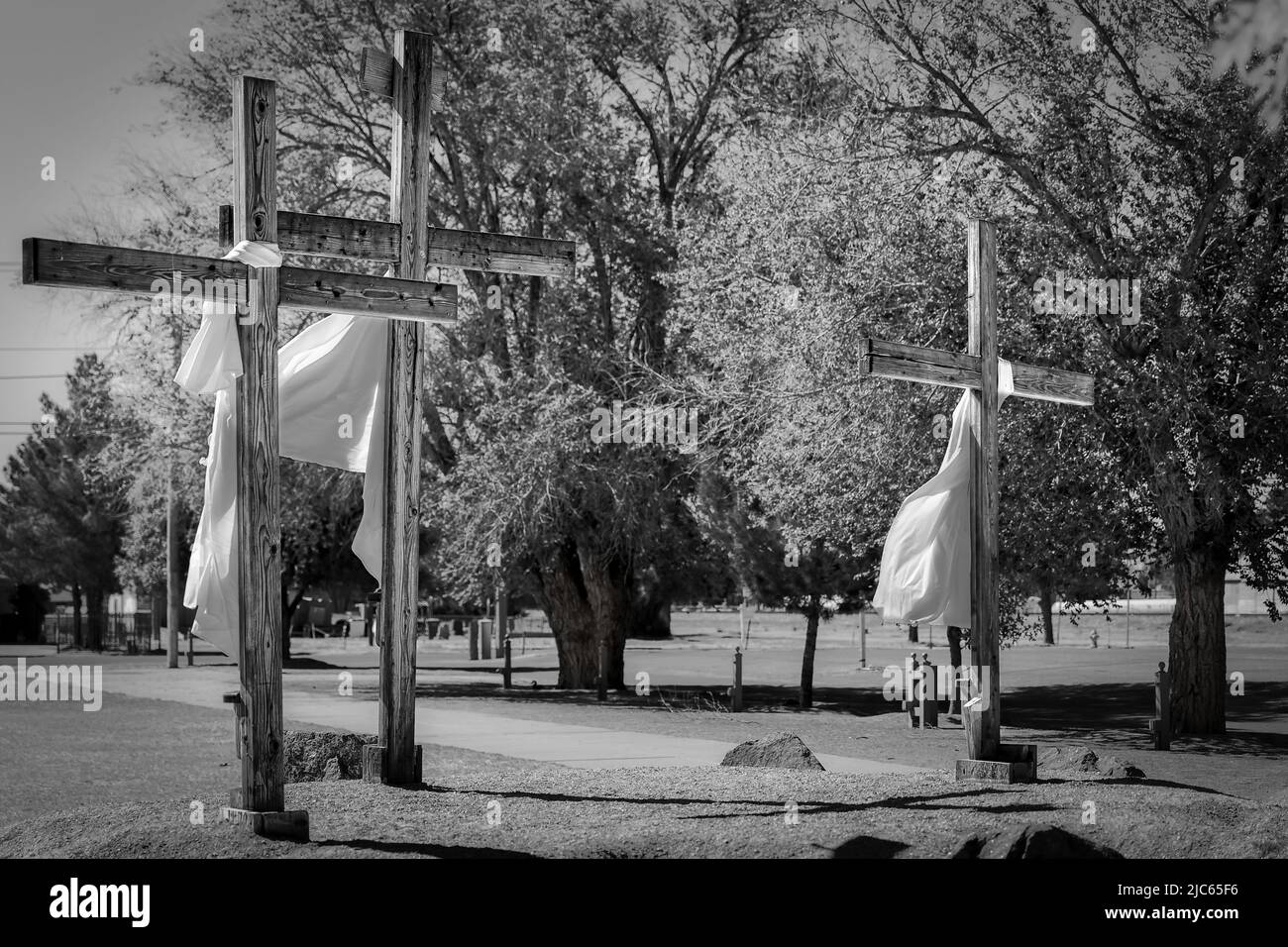 An Easter scene, complete with three crosses, stands in the morning sun ...