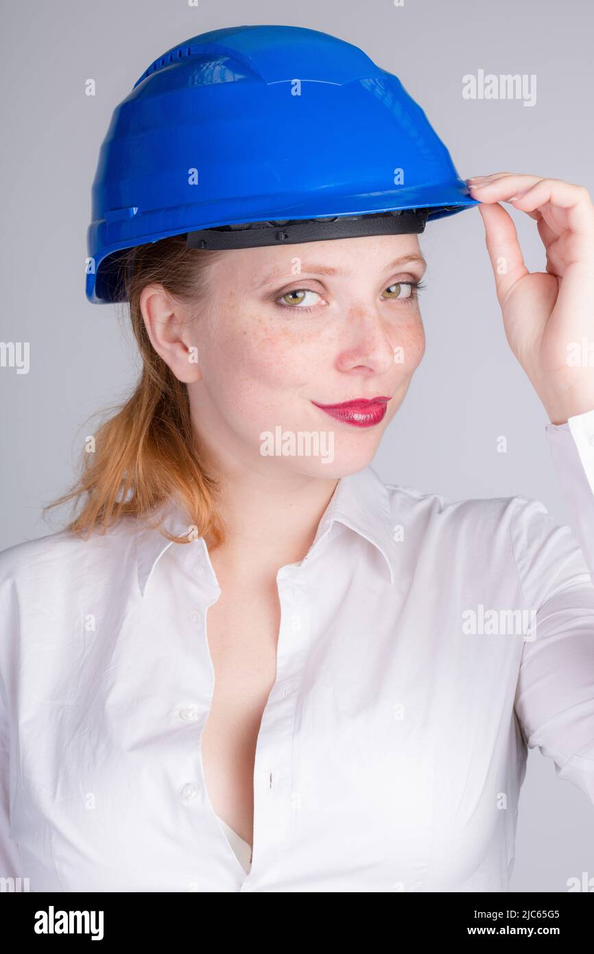 Woman red hat work hi-res stock photography and images - Alamy