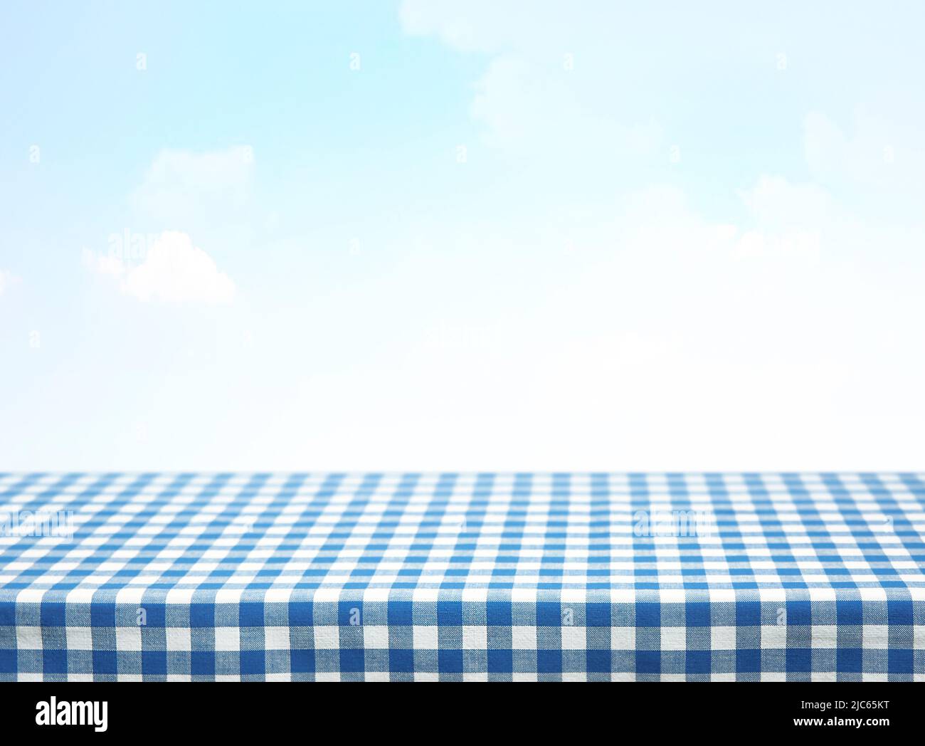 Blue checkered tablecloth empty advertisement space. Food promotion ...