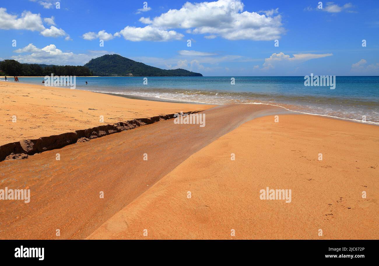Fresh water flows into the sea on beautiful beach, with beautiful white ...