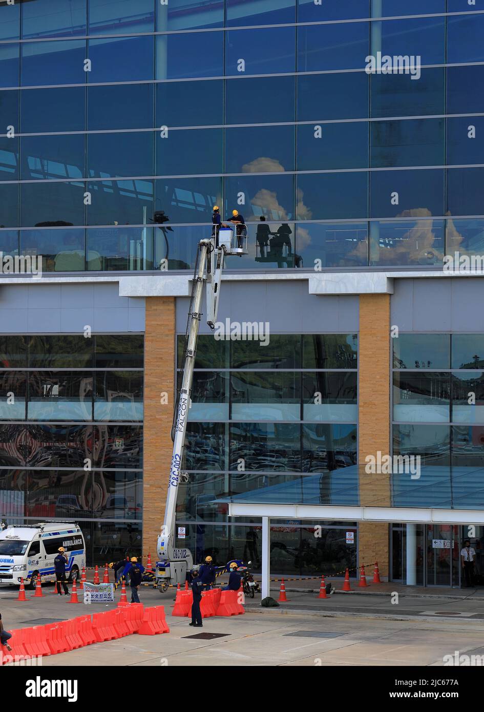 high rise building Window maintain the glass facade of a modern ...