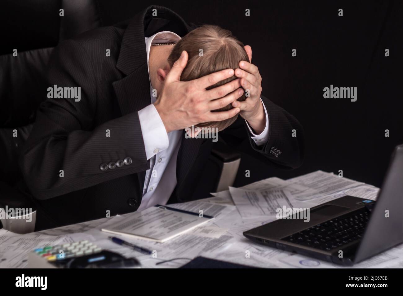 A man with receipts and invoices.Crisis, slump.Insolvent debt ...