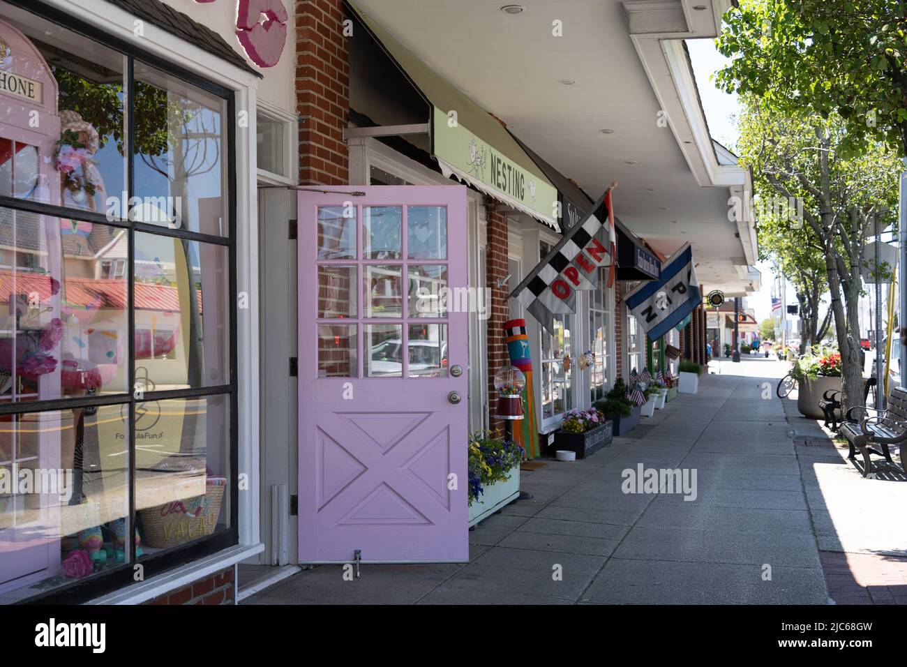 Stone Harbor, New Jersey-June 6, 2022: A charming row of shops along Third Avenue in downtown ...