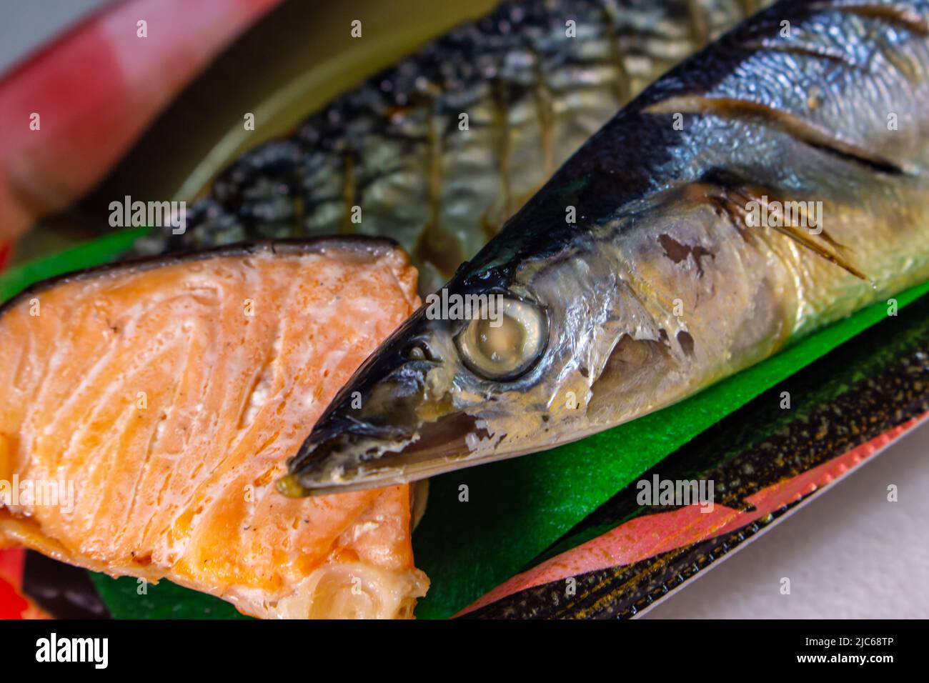 Closeup grilled Japanese Sanma fish (Pacific saury) and Shiojake ...
