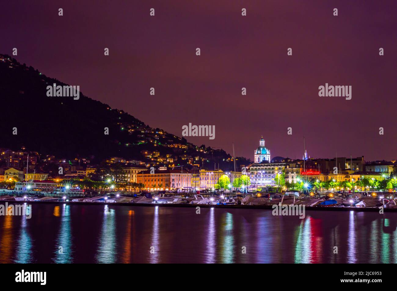 The city of Como, photographed in the evening, with the lakefront, the ...