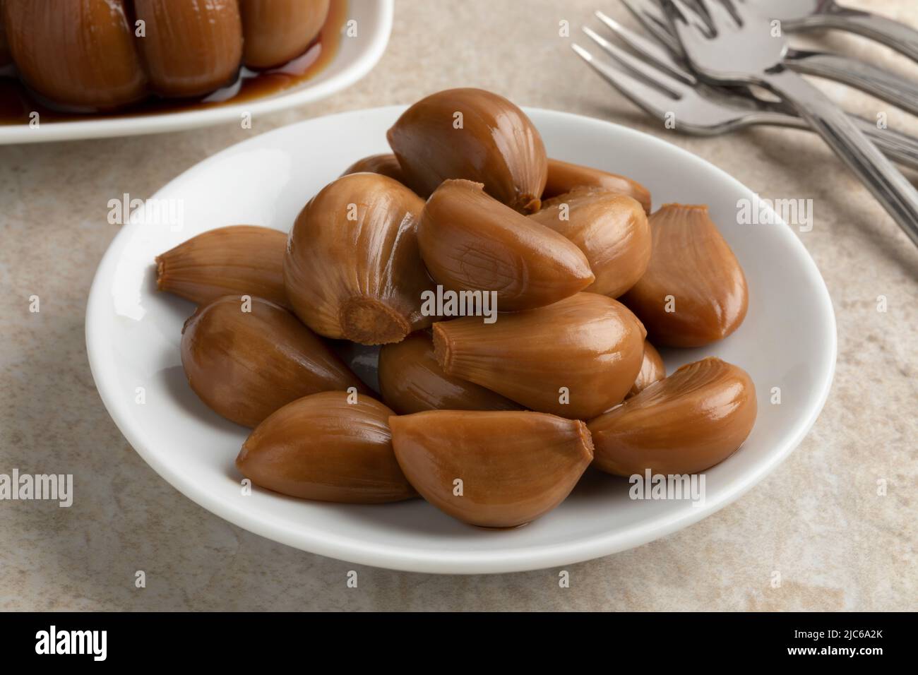 Pickled garlic hi-res stock photography and images - Alamy