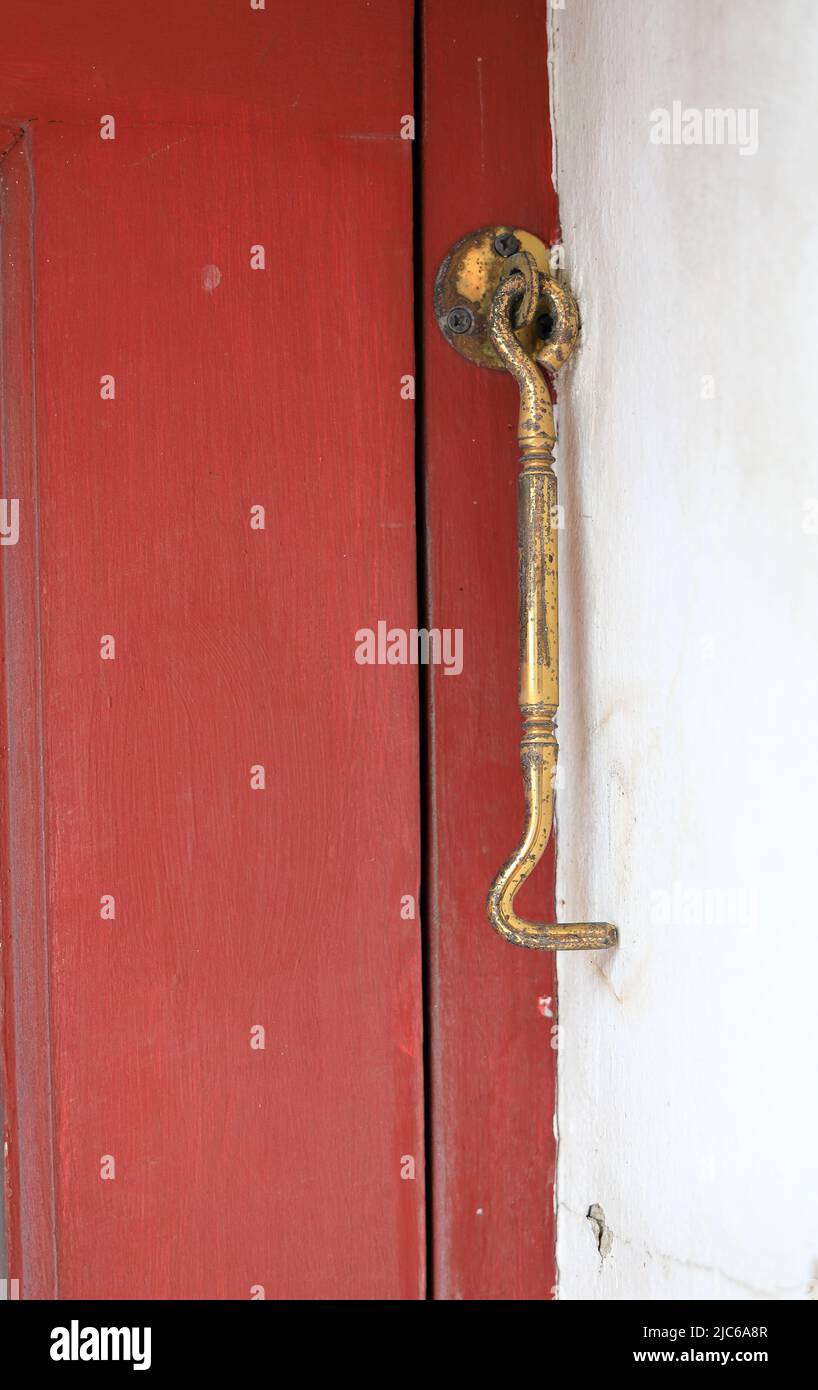 Vintage window latches or metal shutter hook or window hook mounted on ...