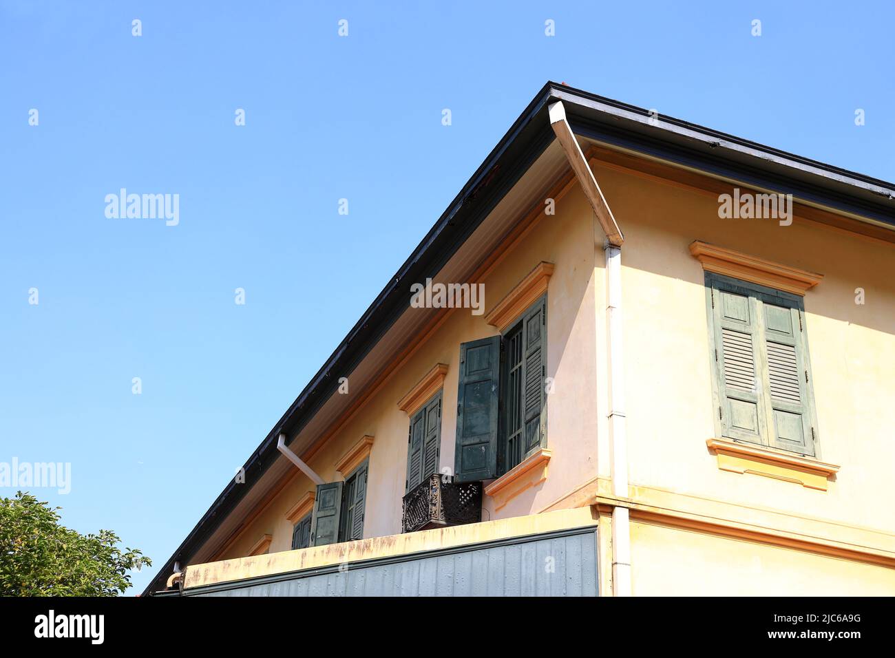 Vintage architecture building facade with beautiful windows detail in ...