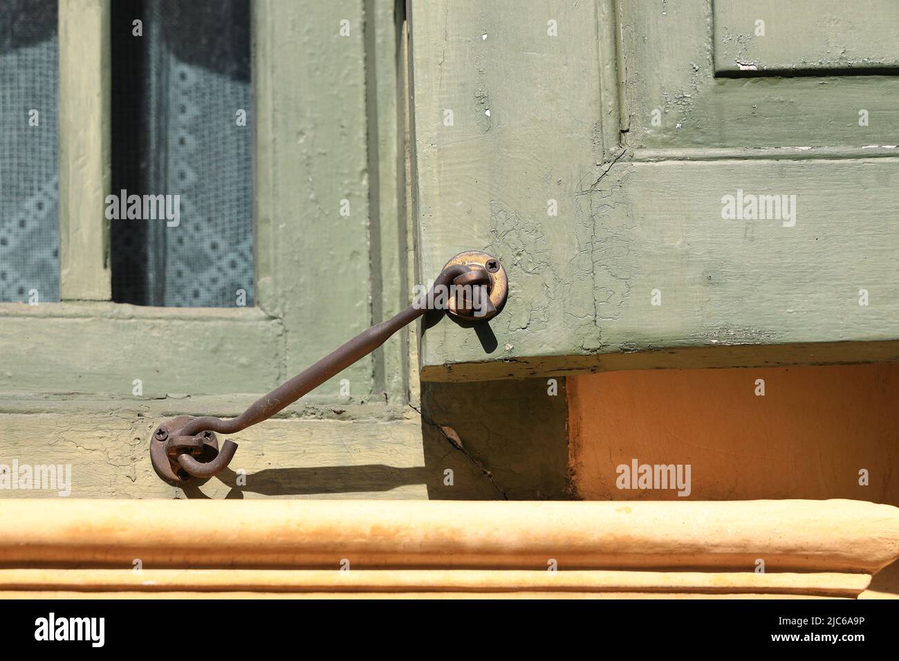 Vintage window latches or metal shutter hook or window hook mounted on ...