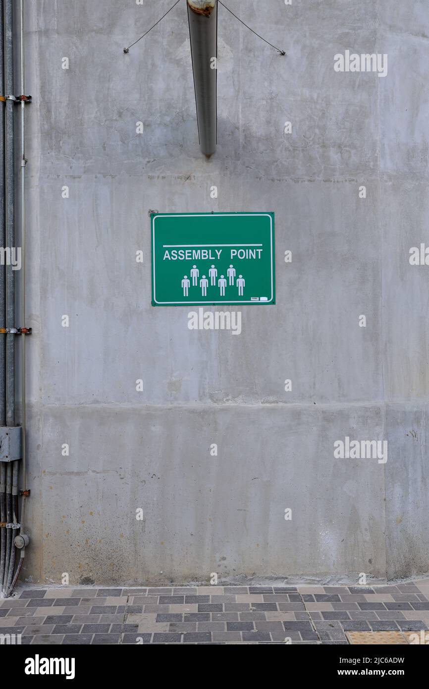 Green sign emergency assembly point hi-res stock photography and images ...