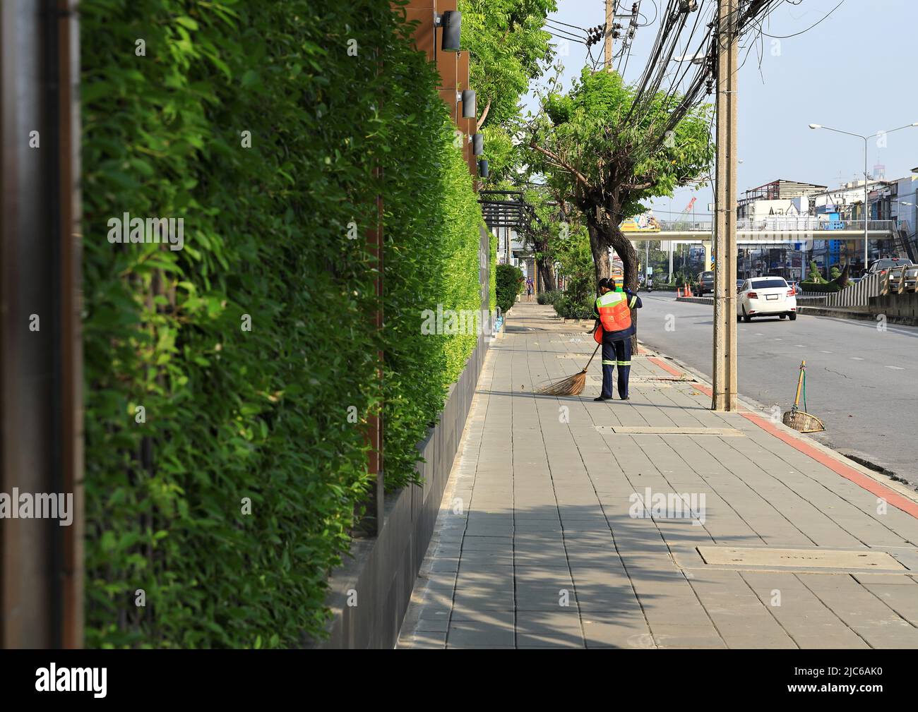 Street cleaners, Road sweeper worker cleaning street with broom tool ...