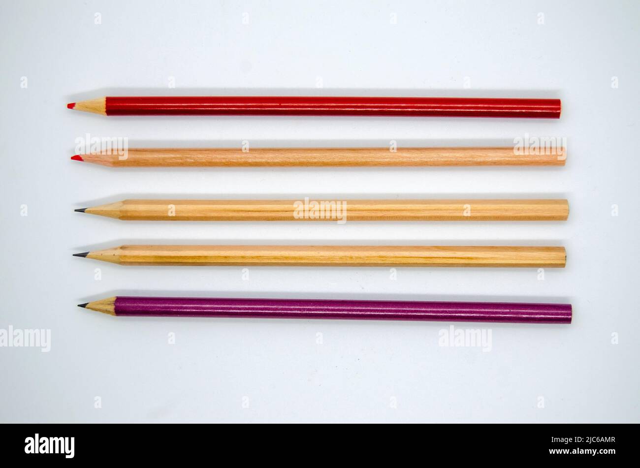 Set of colorful long pencils on white background. Top view, isolated ...
