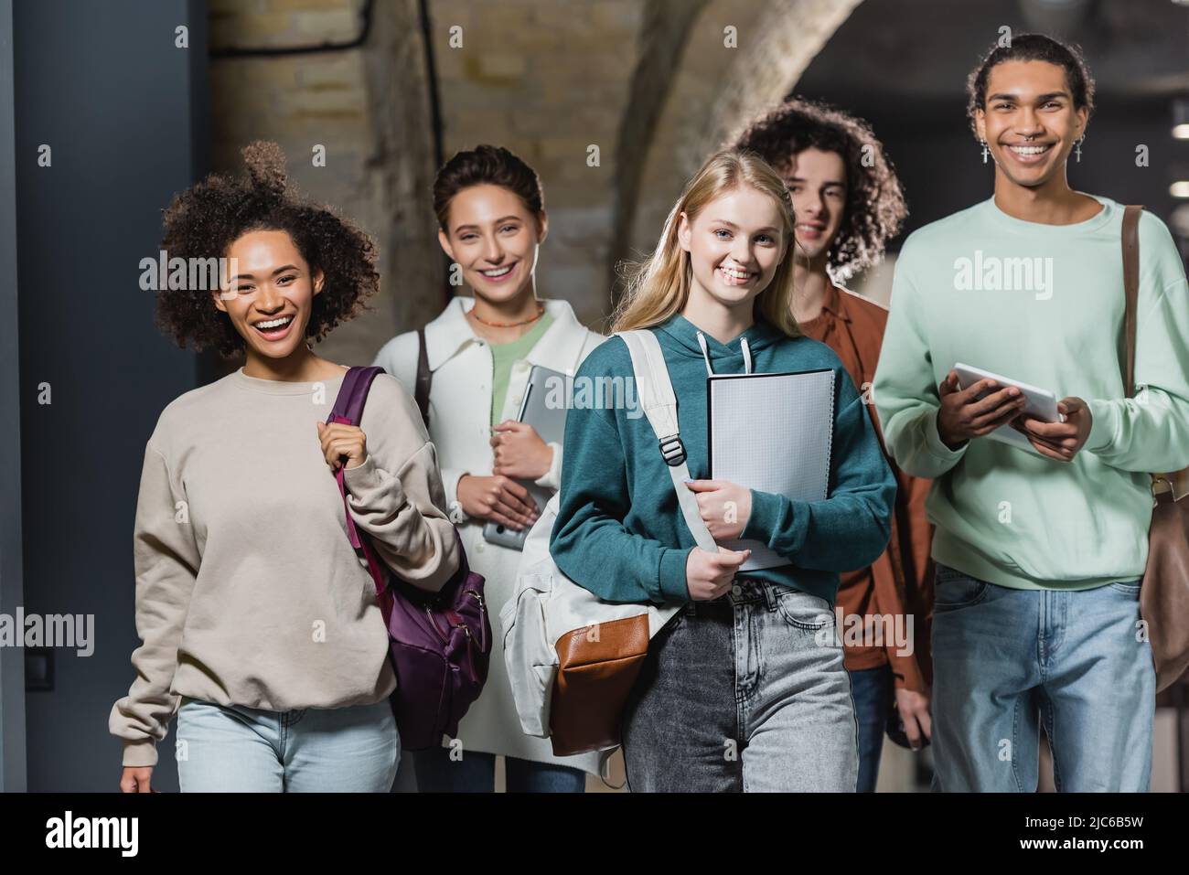 Interracial group students tablet hi-res stock photography and images ...
