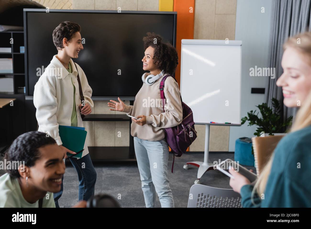 Adult classroom backpack talking hi-res stock photography and images ...