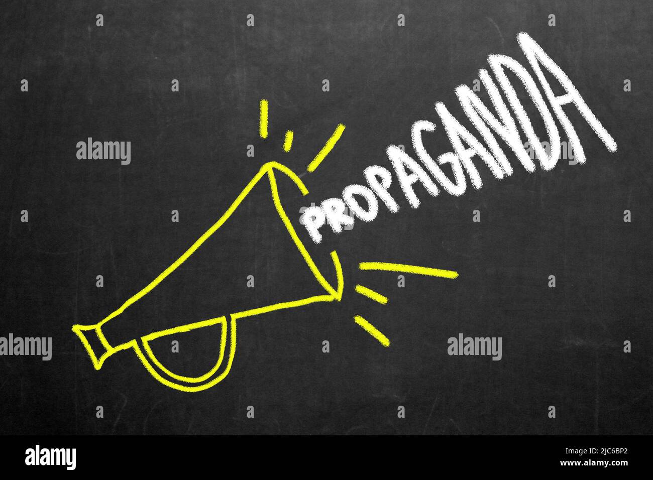 Propaganda and fake news concept. The word propaganda comes out of a ...
