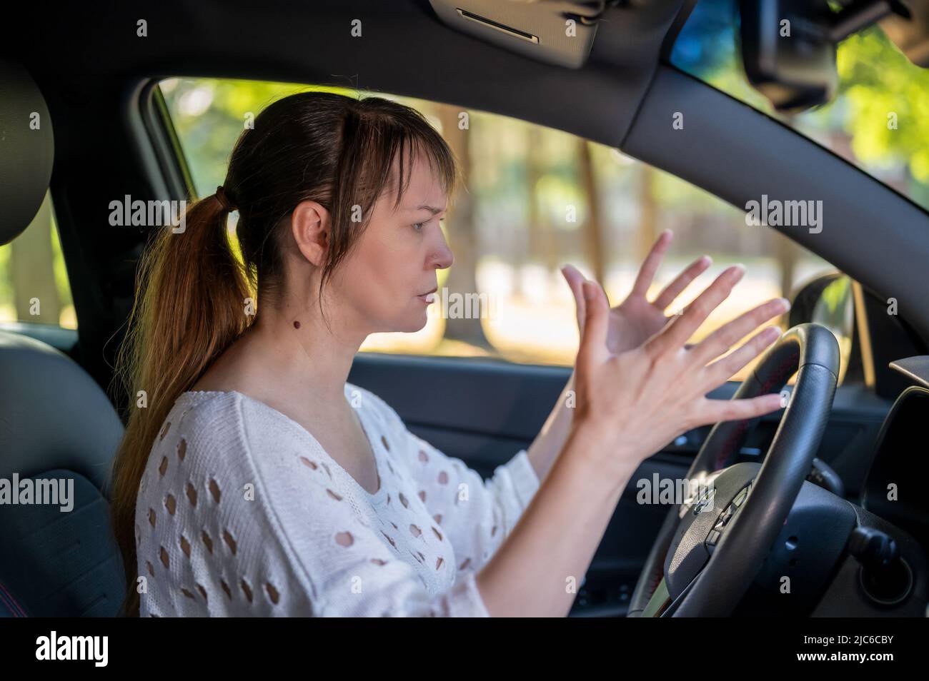 woman resent driving after a car accident. woman driving a car Stock ...
