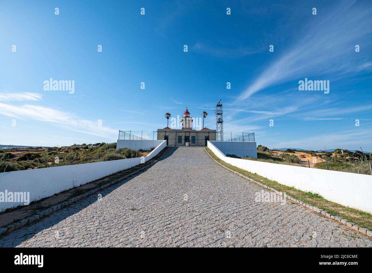 Ponta de Piedade lighthouse on the Algarve coast in Lagos, Portugal ...