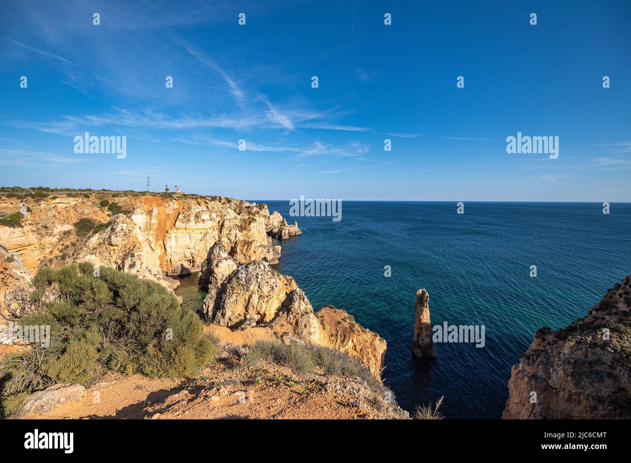 Ponta de Piedade lighthouse on the Algarve coast in Lagos, Portugal ...