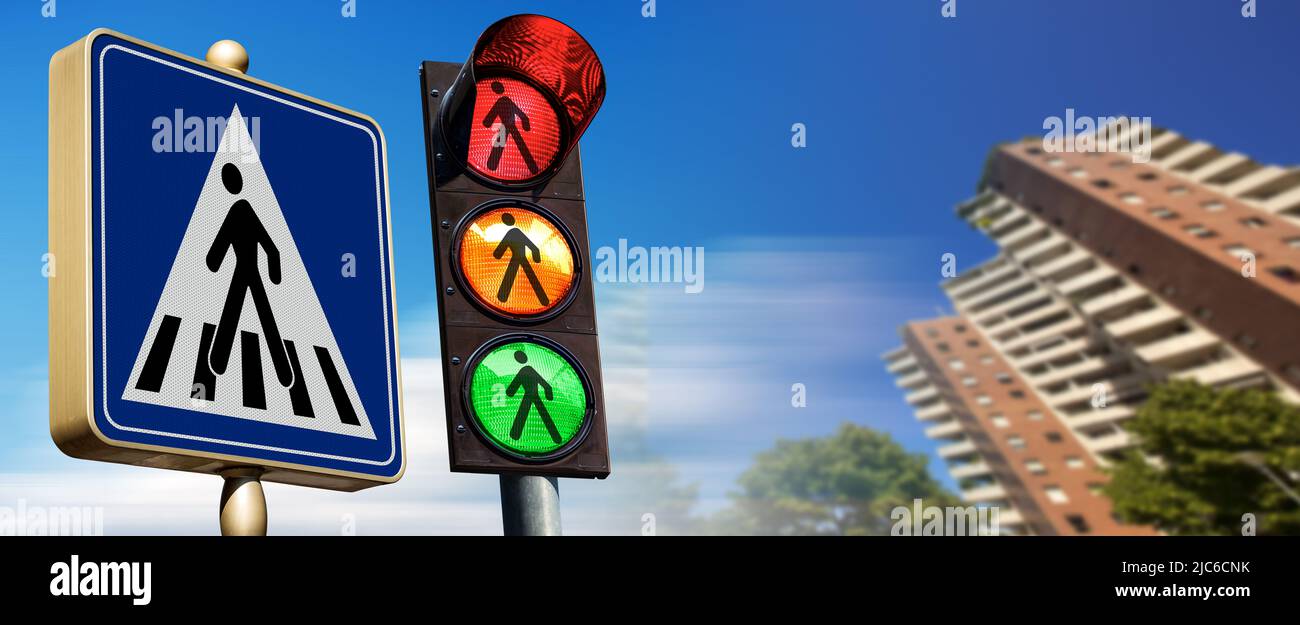 Orange pedestrian crossing sign hi-res stock photography and images - Alamy