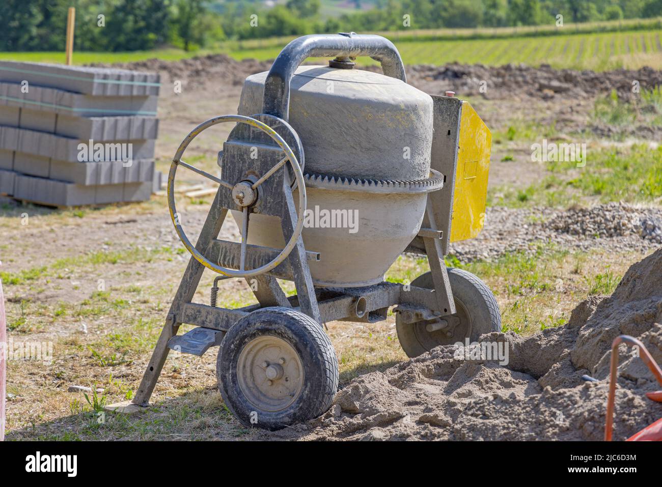 Cement Mixer Machine With Trailer Wheels at Construction Site Stock ...