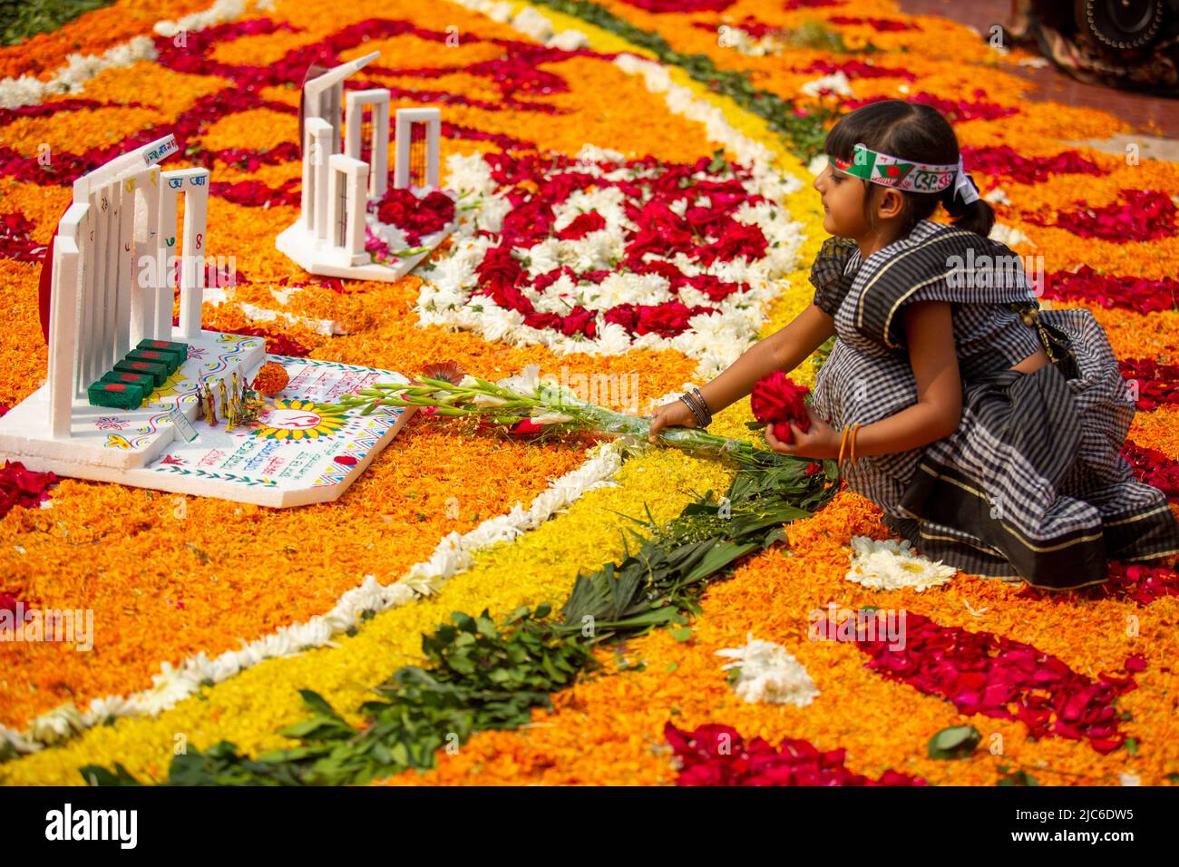 A girl child pays homage to the martyrs of Language Movement in 1952 ...