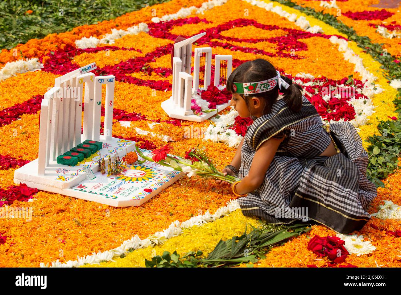 A girl child pays homage to the martyrs of Language Movement in 1952 ...